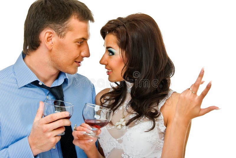 Love talk, Young couple has love talk with glasses of