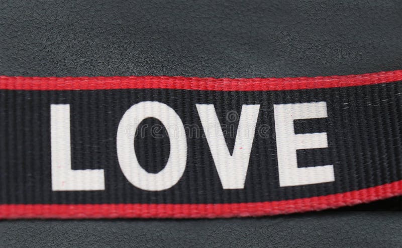 Love text on textile strap stock photo. Image of text - 203844650