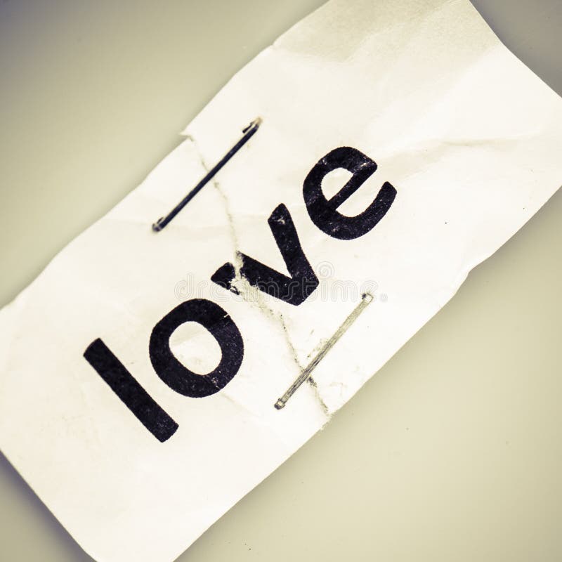 Love Word Written on Torn and Stapled Paper Stock Image - Image of ...
