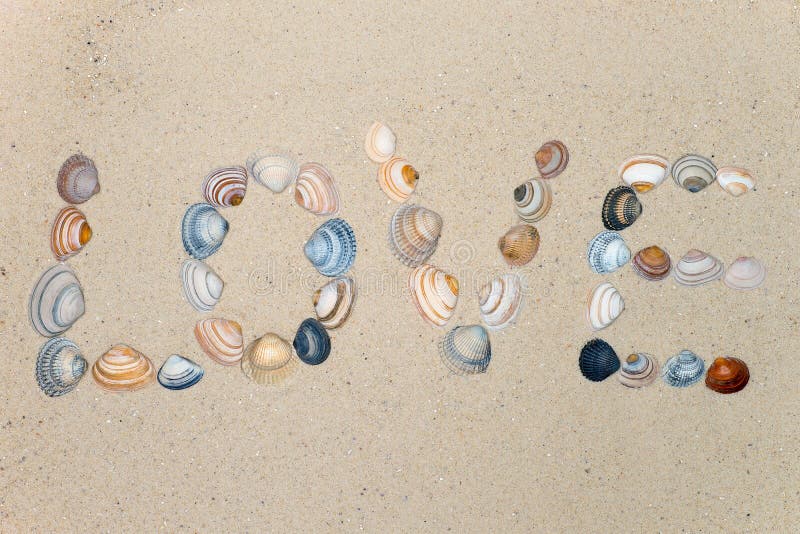 Love Written with Shell on the Beach Stock Image - Image of holiday ...