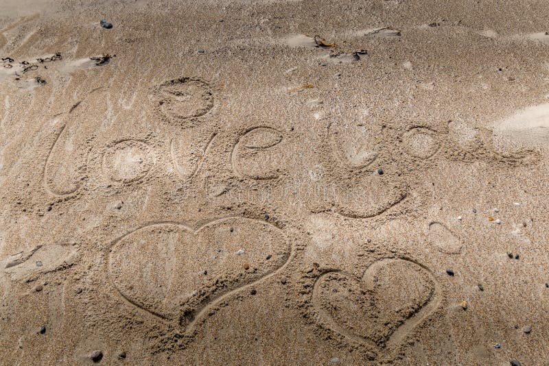 Love You Handwritten in Sand on a Beach Stock Image - Image of draw ...