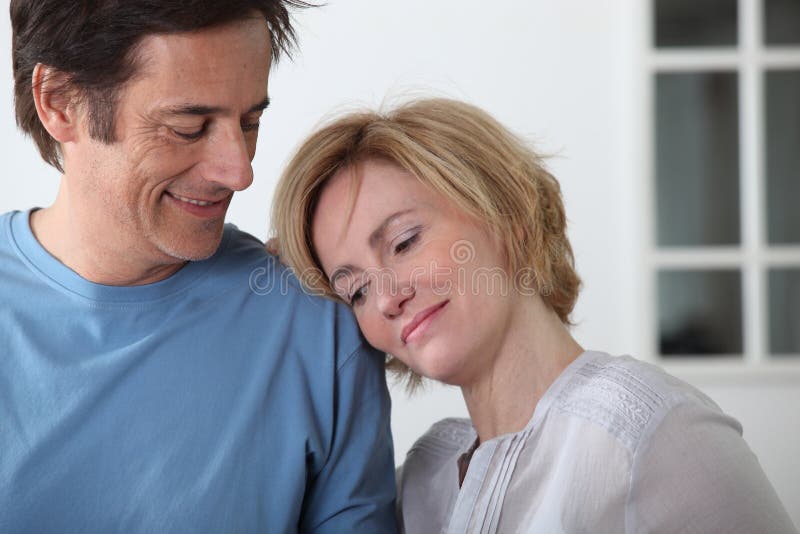 Loved up couple stock image. Image of domestic, inside - 26496169