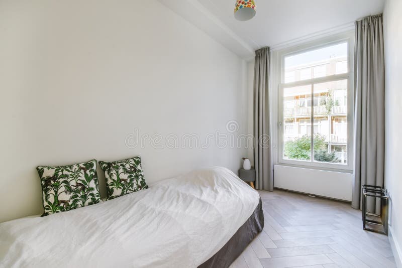 Lovely Bedroom with a Single Soft Bed Stock Photo - Image of elegant ...