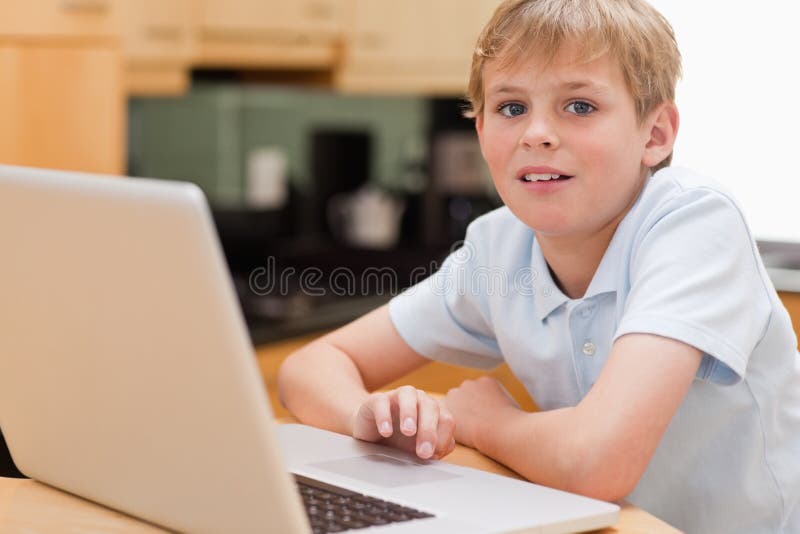 Lovely Boy Using a Notebook Stock Image - Image of modern, online: 22371839