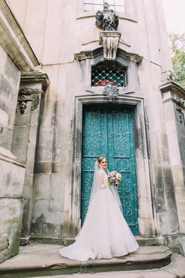 Lovely Bride is Posing Near the Ancient Building. Stock Image - Image ...