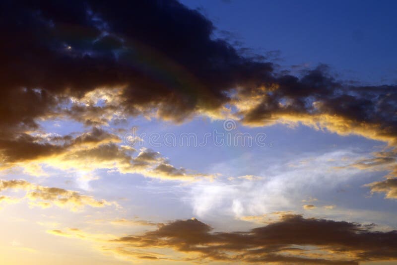 Lovely Bright Sun Colored Clouds on the Sky with Rainbow for Using in ...