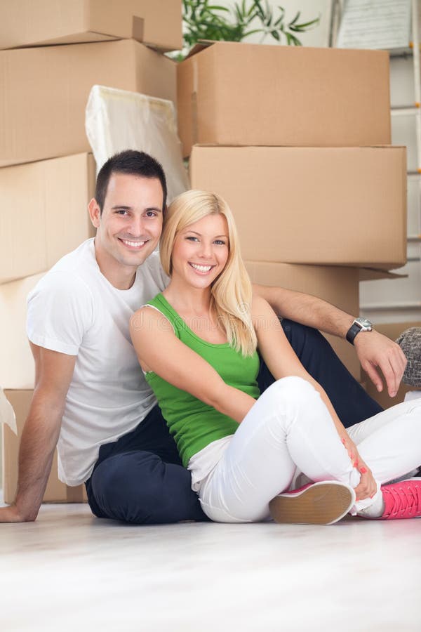 Young Couple Moving House stock photo. Image of happiness - 9281636