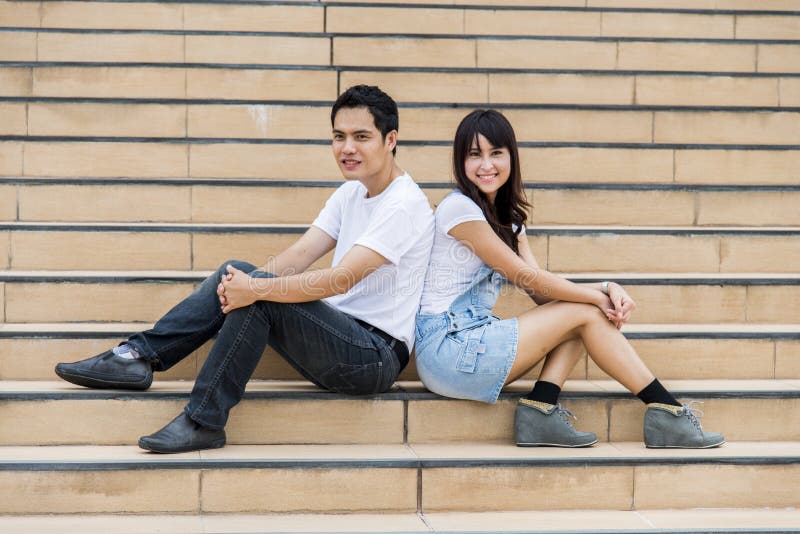 Lovely Couple Sit on the Stairs1 Stock Image - Image of camera ...