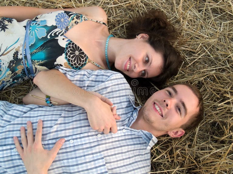 Lovely couple in straw stock photo. Image of resting, people - 5823220