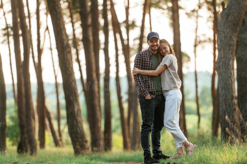 Lovely Couple are Together in the Forest at Summer Daytime Stock ...