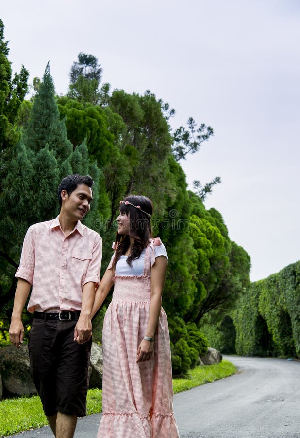Lovely Couple Walk Together in the Garden3 Stock Photo - Image of ...