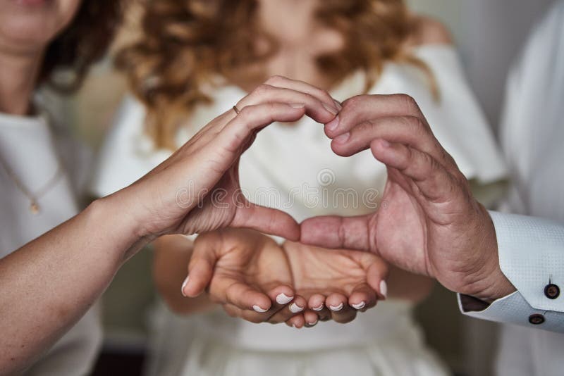 Lovely Family Show a Heart Shape from Hands Stock Image - Image of ...