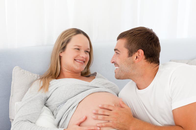 Lovely Future Parents Resting on a Bed Stock Image - Image of natural ...
