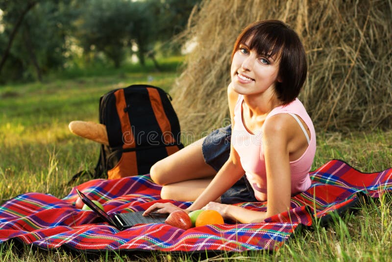 Lovely Girl Having a Rest in the Park Stock Photo - Image of computer ...
