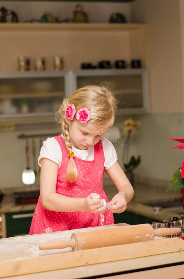 Lovely girl in kitchen stock image. Image of seasonal - 63390115