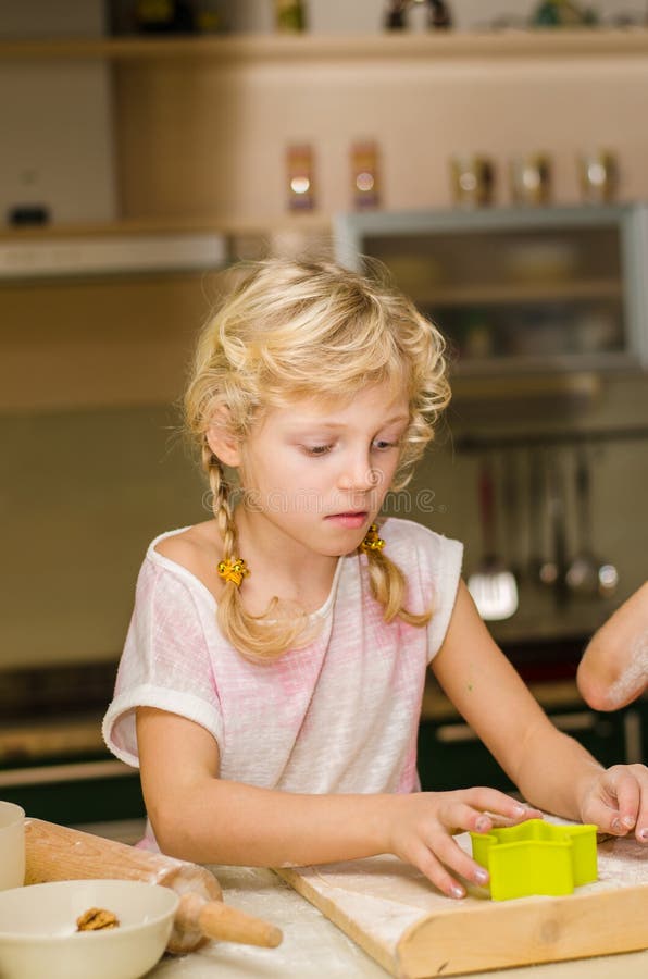 Lovely girl in kitchen stock image. Image of happy, caucasian - 63390459