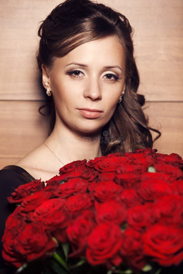Lovely girl with roses stock photo. Image of life, birthday - 31977116
