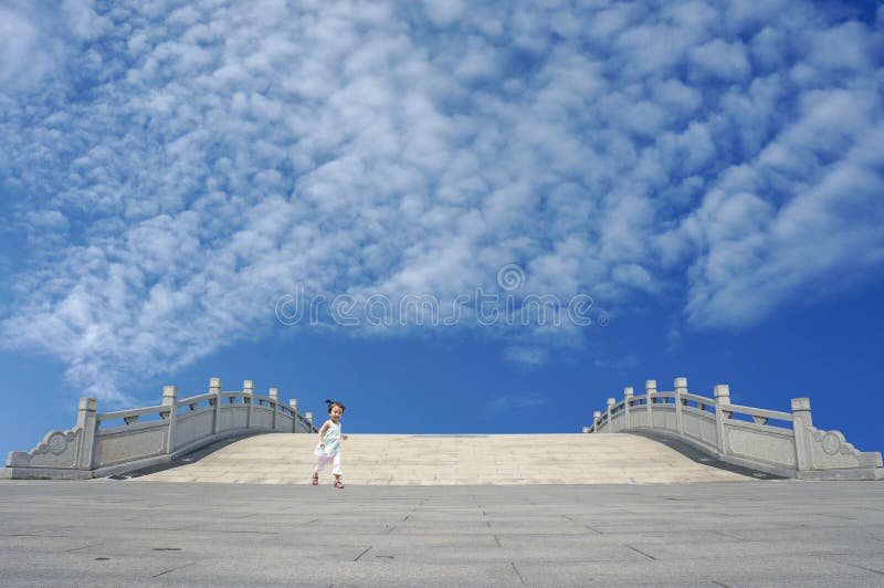 Lovely Girl Running Down Stone Bridge Stock Photo - Image of block ...