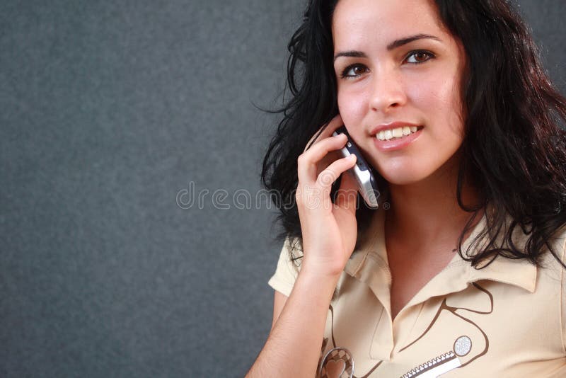 Lovely Girl Talking on a Cell Phone Stock Photo - Image of blouse, eyes ...