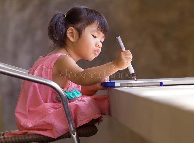 Lovely Kid Practice for Writing on White Broad before Class Lear Stock ...