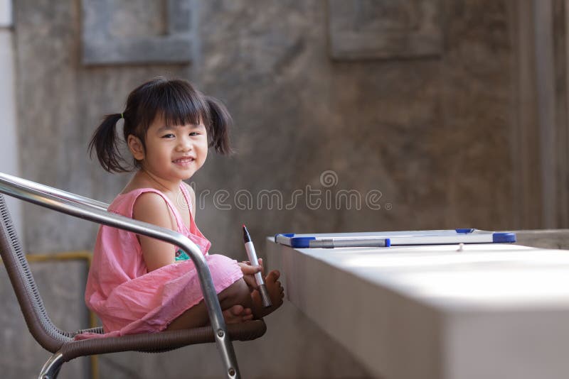 Lovely Kid Practice for Writing on White Broad before Class Lear Stock ...