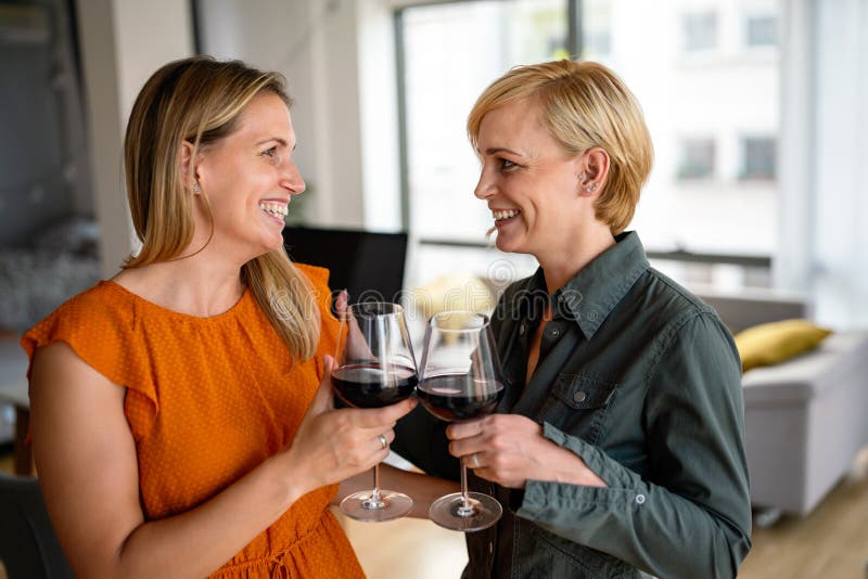 Lovely Lesbian Couple Spending Time Together And Drinking Wine Lgbt