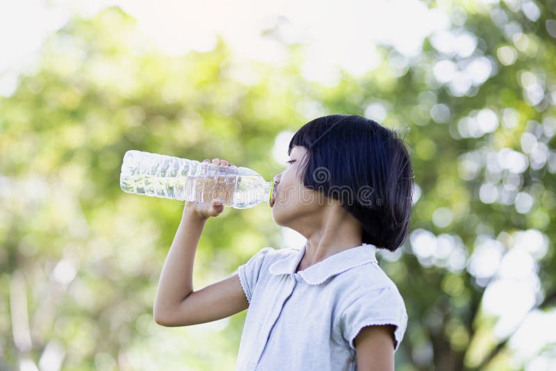 Lovely Little Girl Drinking Water Stock Photo - Image of lifestyle ...