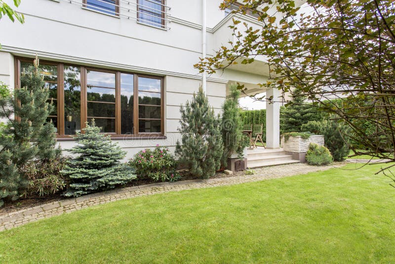 Lovely setting for a house stock photo. Image of exterior - 73335160