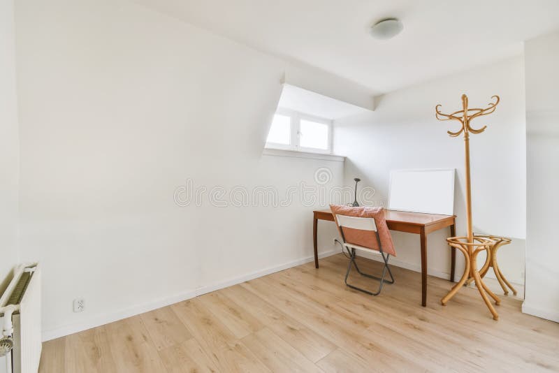 A Lovely Spacious Room with a Work Area Stock Photo - Image of luxury ...