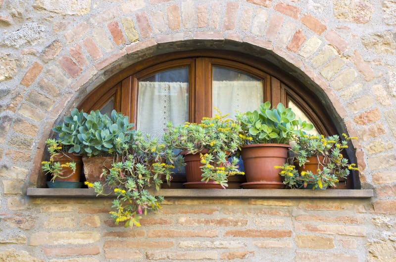 Lovely tuscan doors stock image. Image of ornamental - 11465857