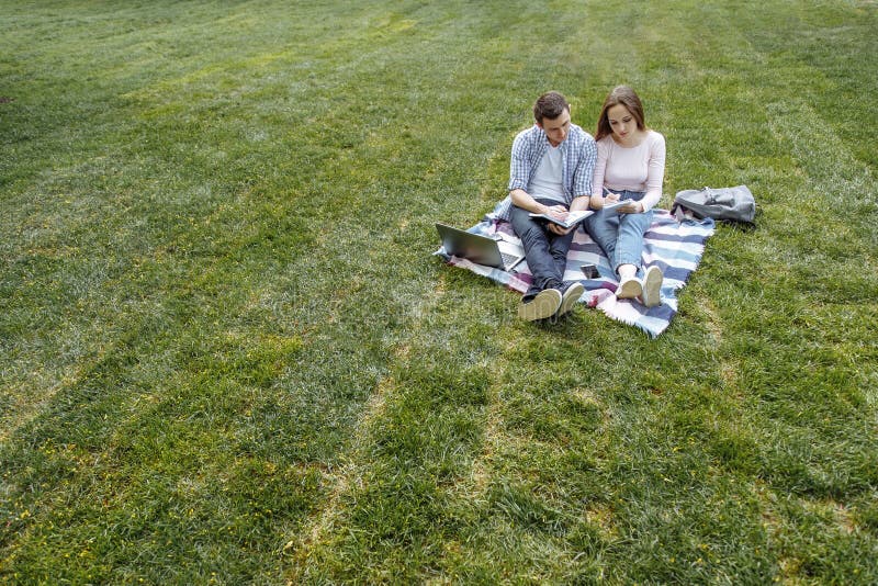 Lovely University Students Studying Outdoors. Copy Space Stock Photo ...