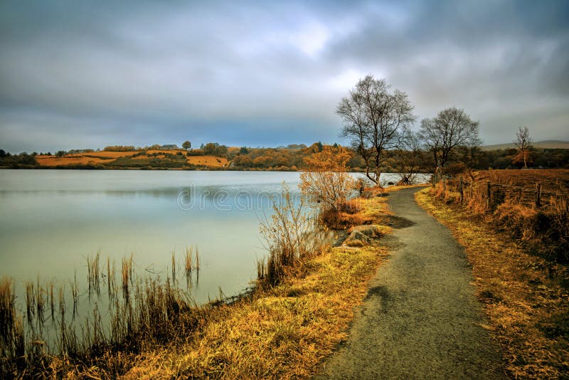 Lovely walk by the lake stock photo. Image of lovely - 110561602
