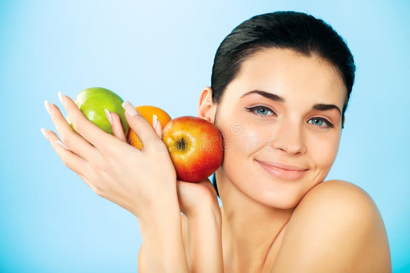 Lovely woman with fruit stock photo. Image of happy, natural - 64667854