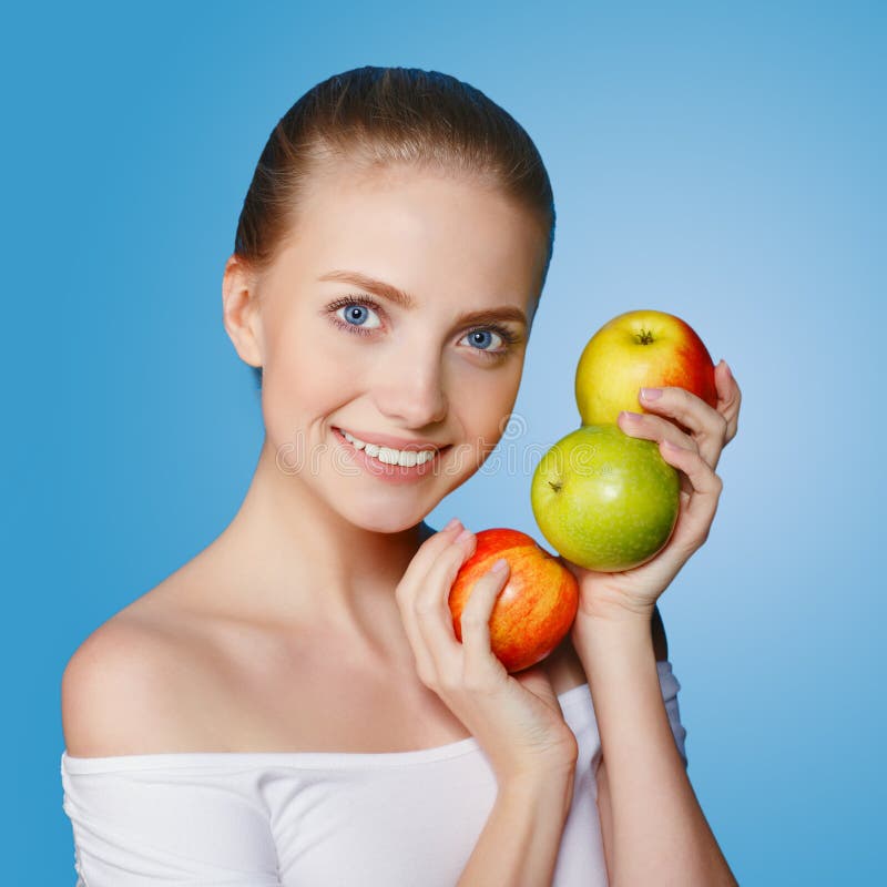 Lovely woman with fruit stock photo. Image of brunette - 85614962