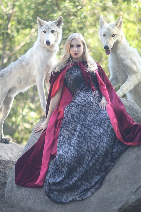 Lovely Woman Posing with Wolves Outdoors Stock Photo - Image of lady ...