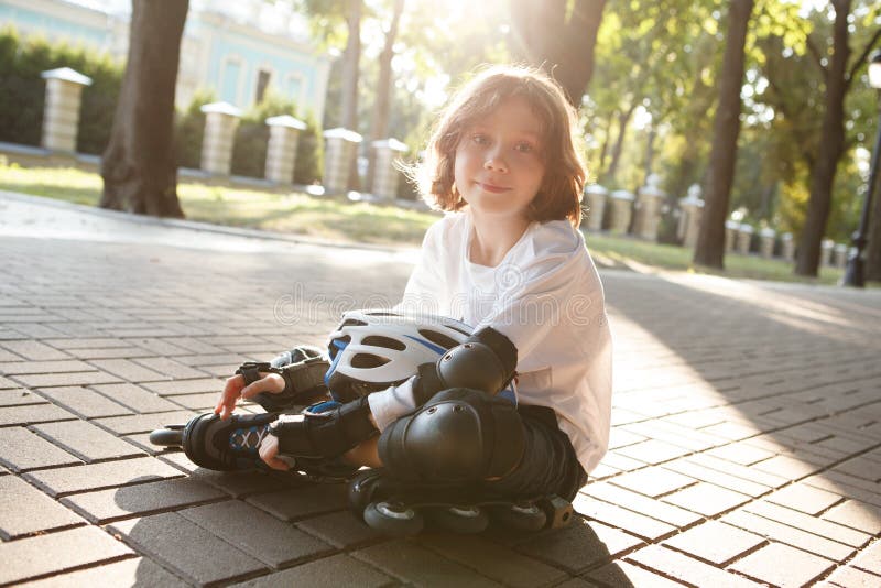 Lovely Young Boy Rollerblading in the Park Stock Image - Image of ...