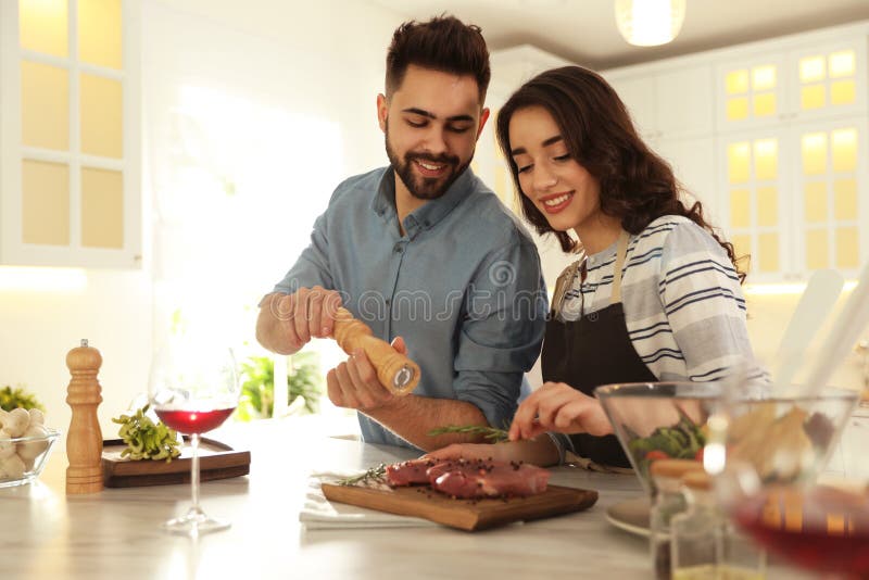 Lovely Young Couple Cooking Meat in Kitchen Stock Image - Image of home ...