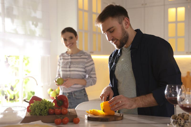 Lovely Young Couple Cooking in Kitchen Stock Image - Image of cooking ...