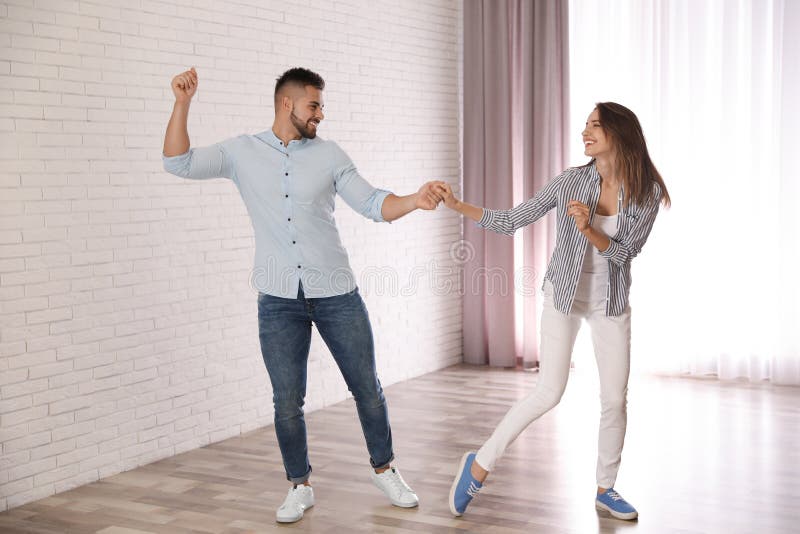 Lovely Young Couple Dancing Together Stock Photo - Image of family ...