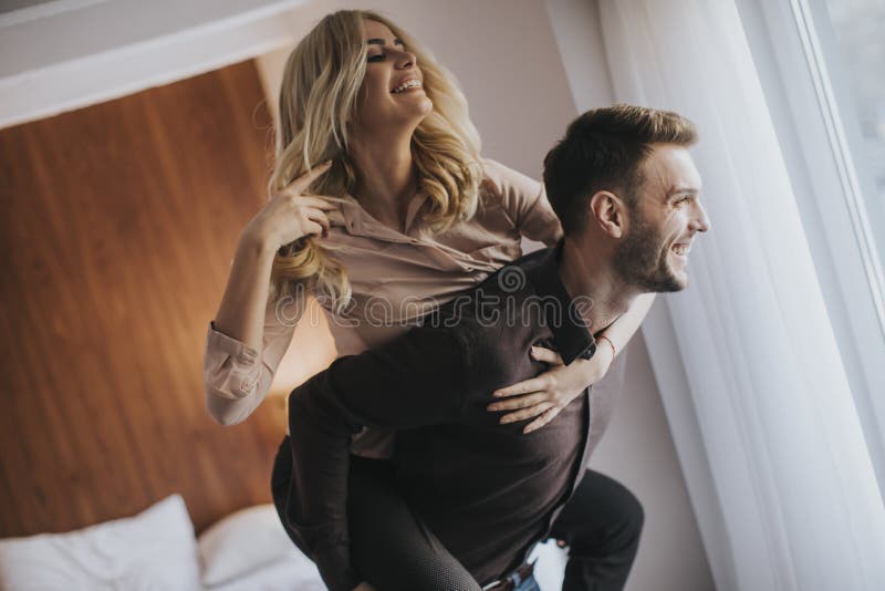 Young Couple Having Fun in the Room Stock Image - Image of partners ...