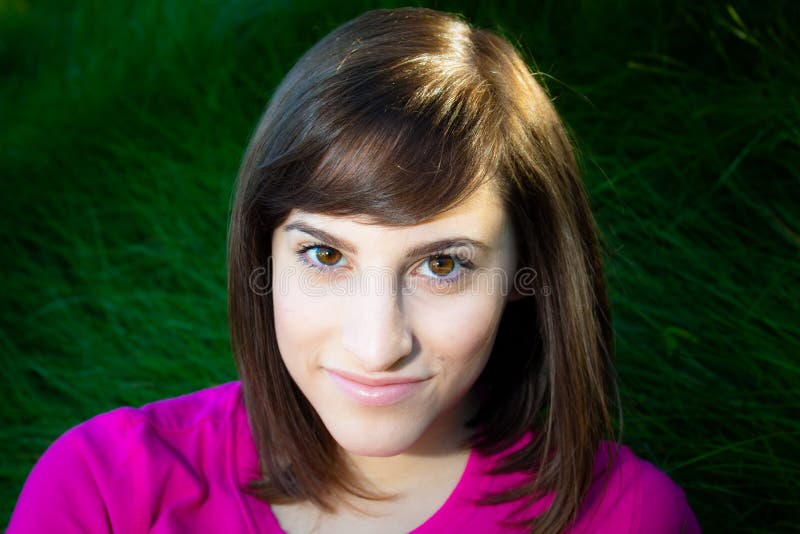A Lovely Young Women Smiling into the Camera Stock Photo - Image of ...