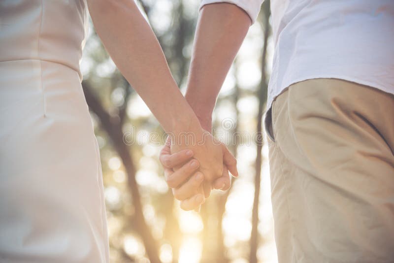 Lover Catching Hands at Sunset Period Stock Photo - Image of boyfriend ...