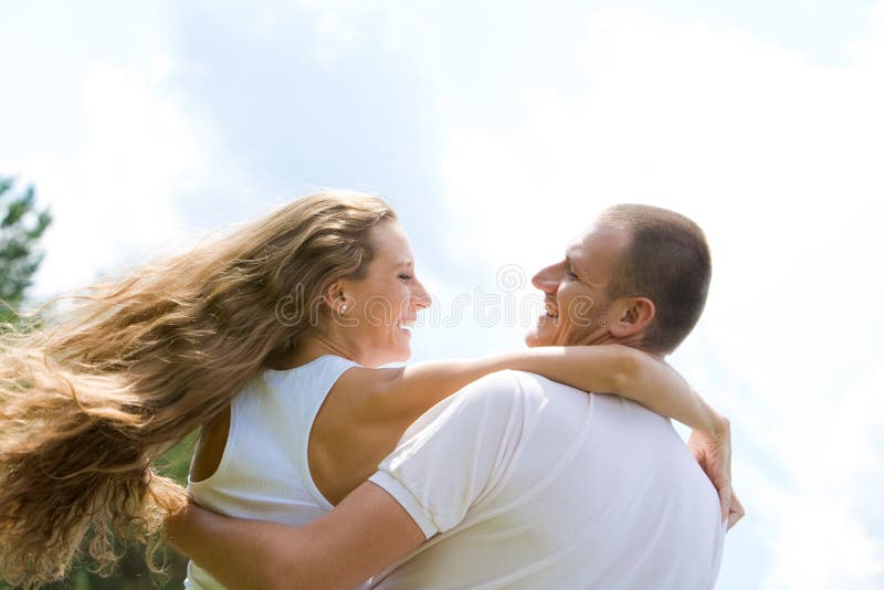 Couple Chasing One Another through Dunes Stock Photo - Image of ...