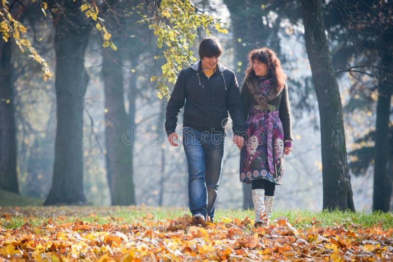 Lovers during autumn stock photo. Image of smiling, romancelovers ...