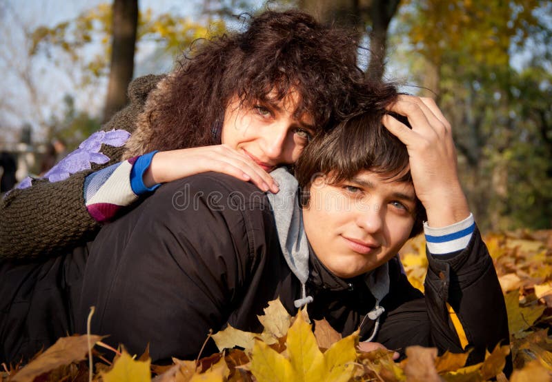 Lovers during autumn stock image. Image of park, couple - 26892679