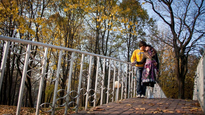 Lovers during autumn stock image. Image of women, happiness - 26892941