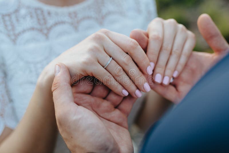 Lovers Holding Hands with Gold Wedding Rings. Wedding. Stock Photo ...
