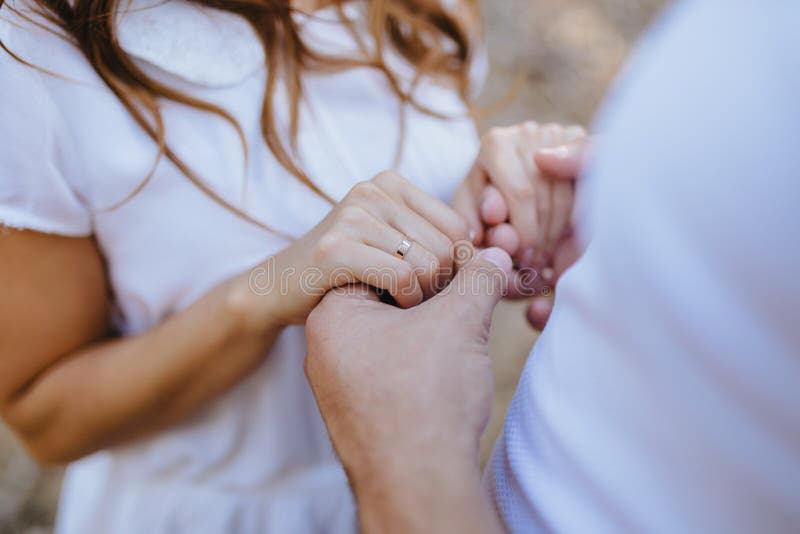 Lovers Holding Hands With Gold Wedding Rings Bride And Groom Stock