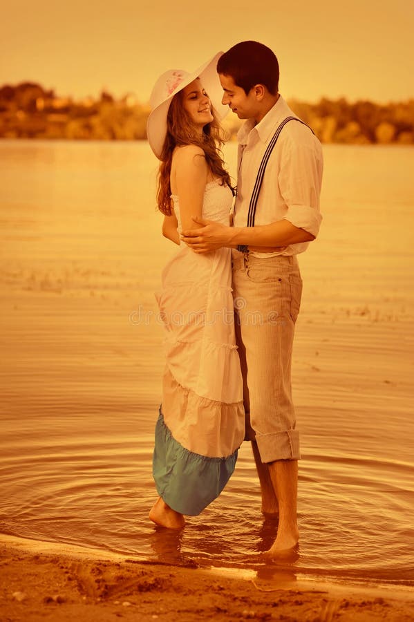Lovers Kiss in the Water on the Lake Stock Image - Image of book, idyll ...