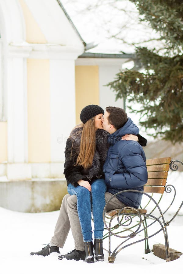 Lovers Kissing on the Bench Stock Image - Image of lifestyle, cuddling ...